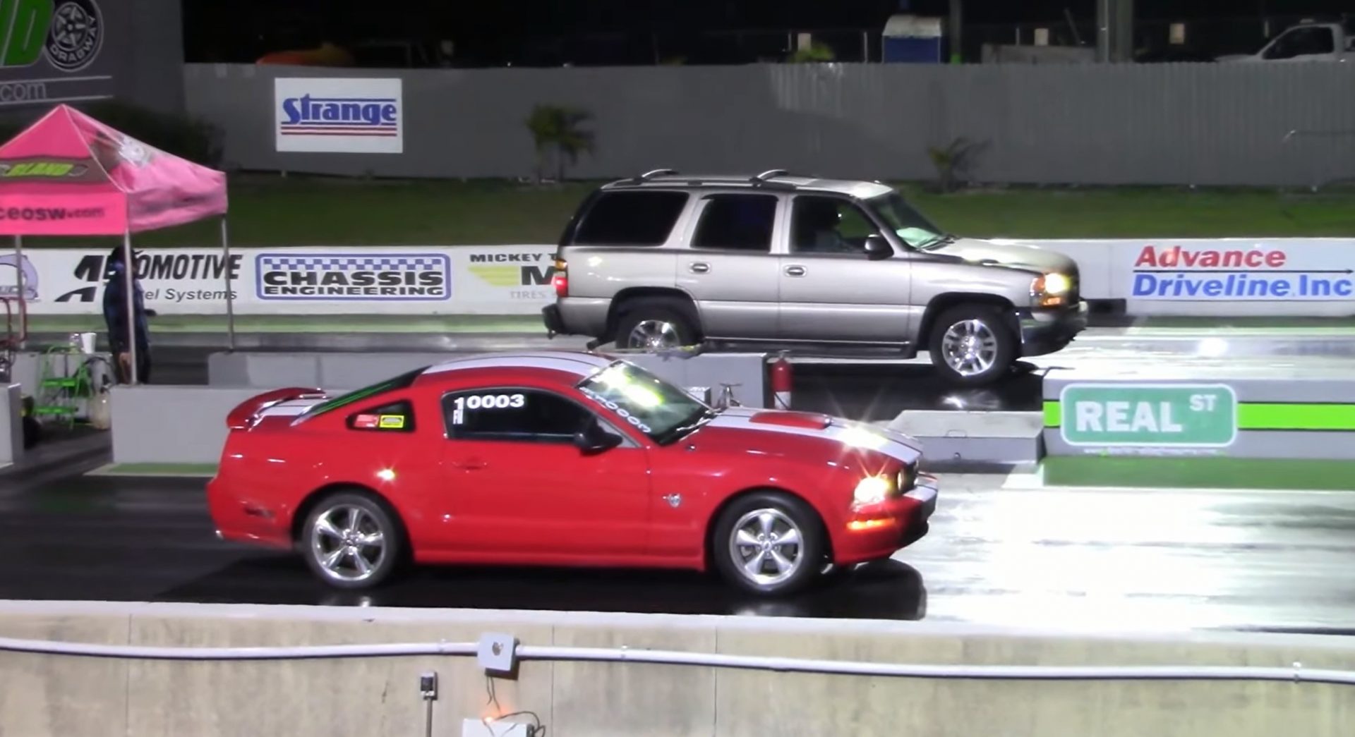Sleeper GMC Yukon Drag Races Camaro ZL1, Lays Waste to Whole Field of ...