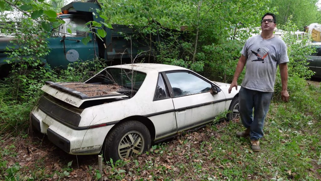 1984 Pontiac Fiero 2M4 Forgotten in the Woods Is Covered in Pine ...